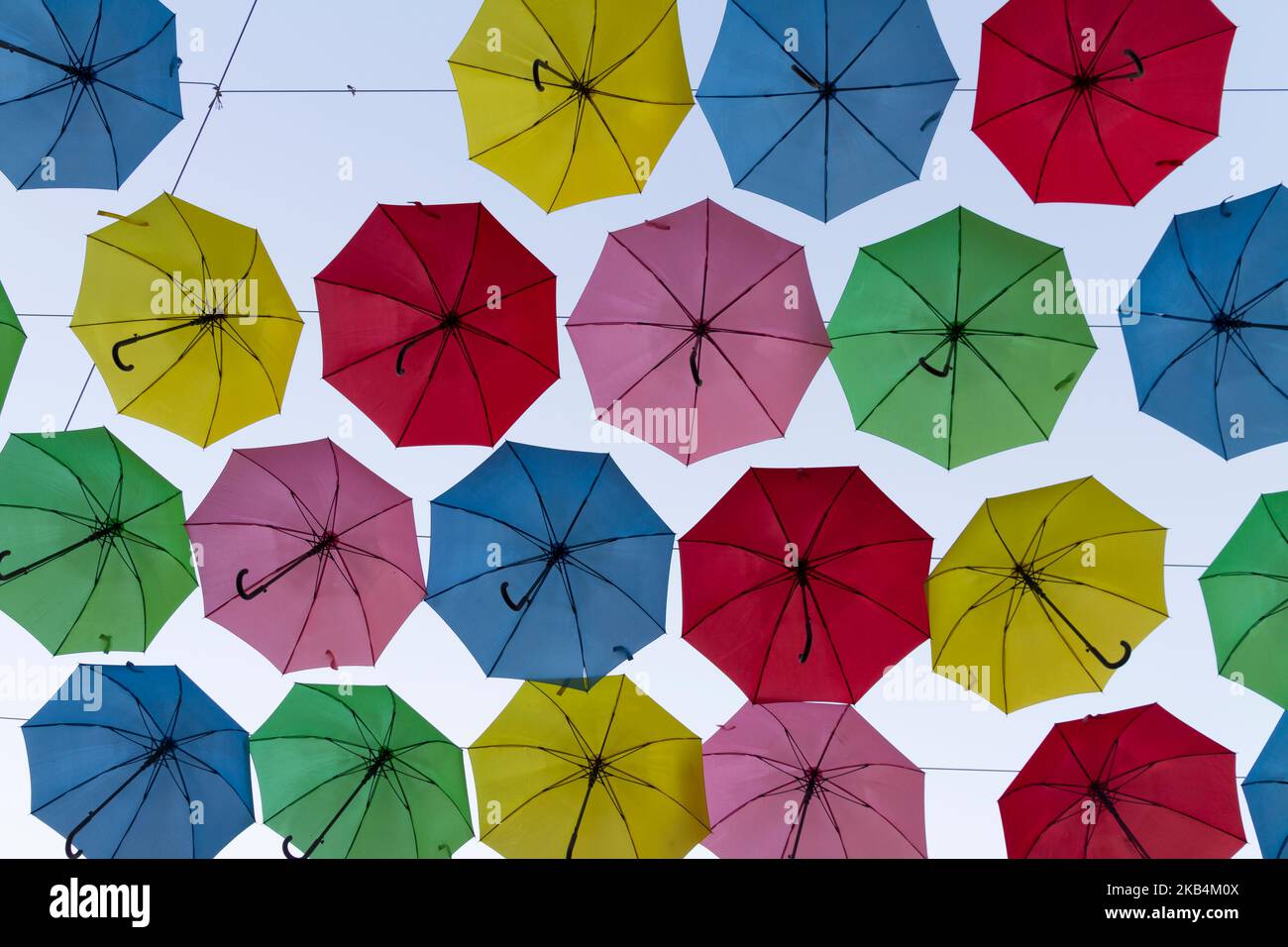 multi-color Umbrella display hanging high over a street in Jerusalem ...