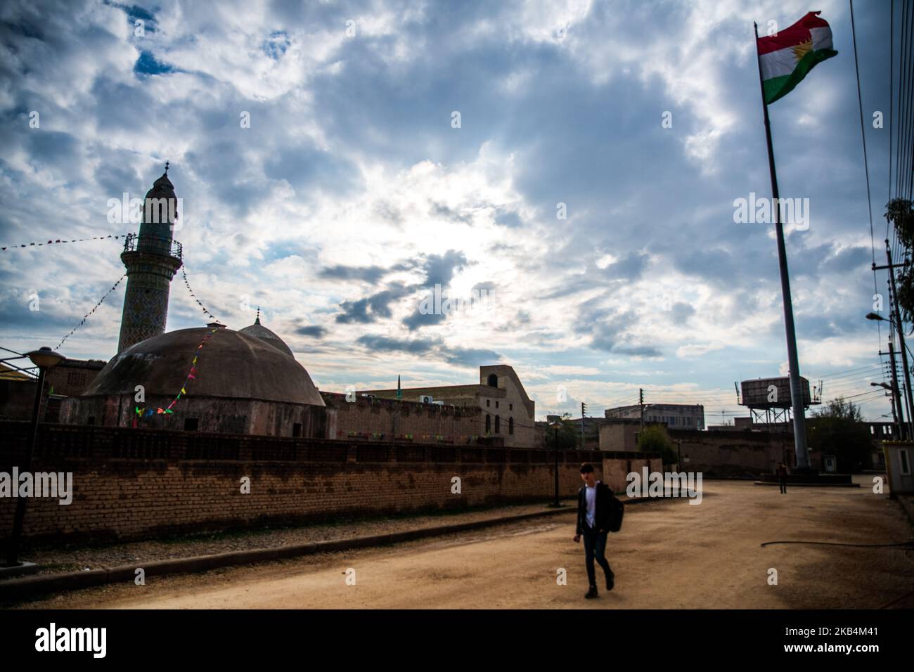 The old city of Irbil, with a huge Kurdish flag visible from all the ...