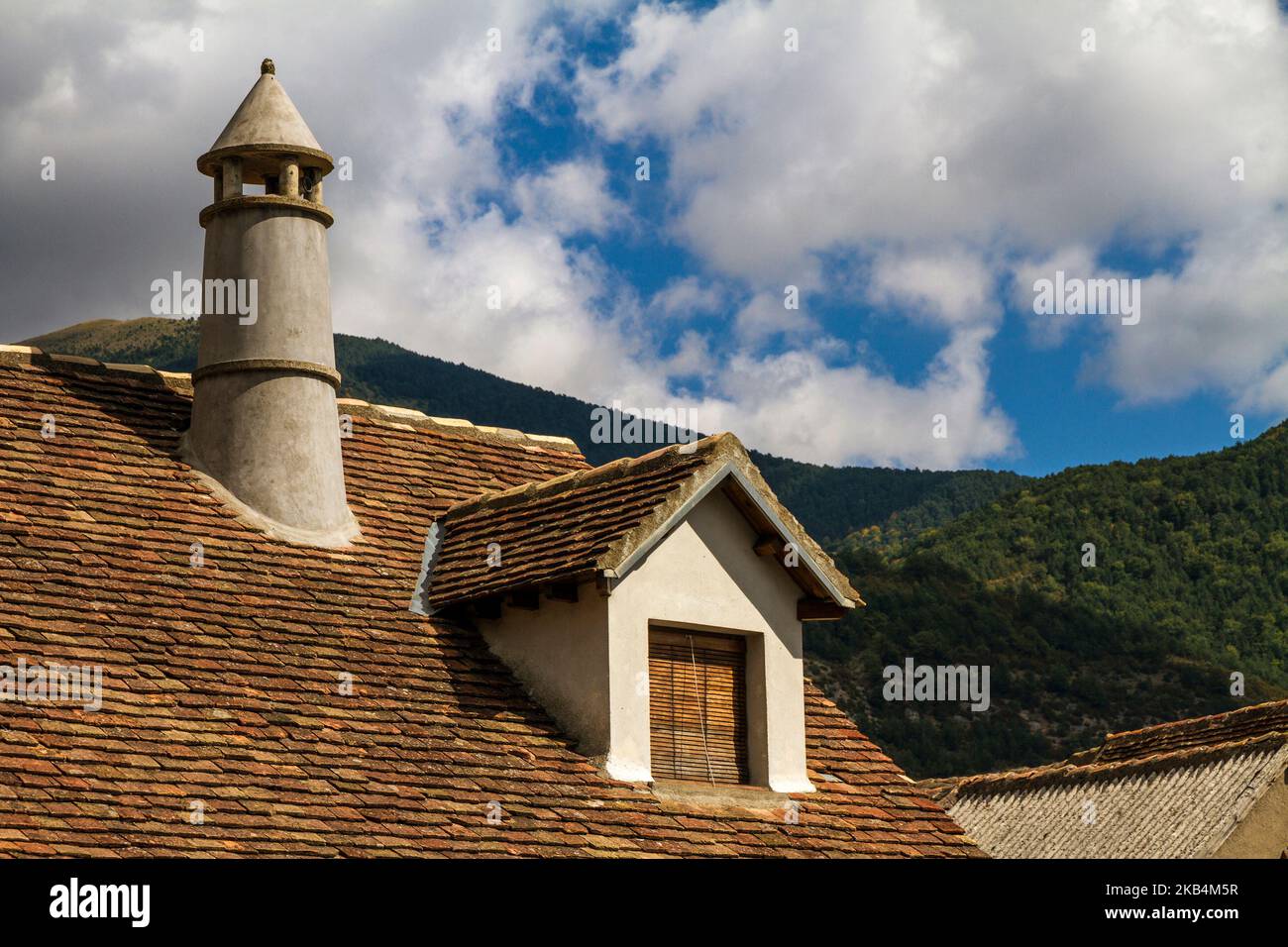 Old style Roof of house with chimney Stock Photo - Alamy