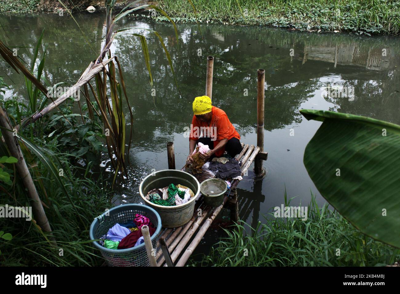 Citizens use dirty river water for their daily needs at Cikarang ...