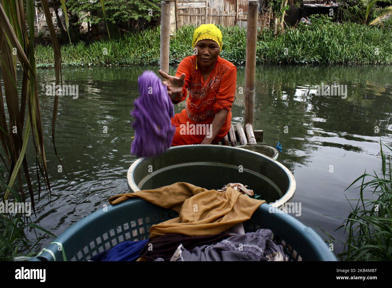 Citizens use dirty river water for their daily needs at Cikarang ...