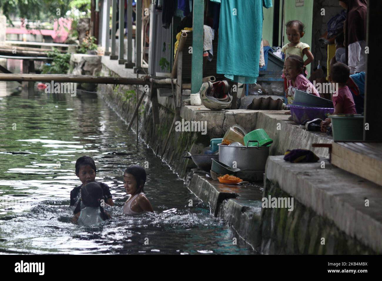 Citizens use dirty river water for their daily needs at Cikarang ...