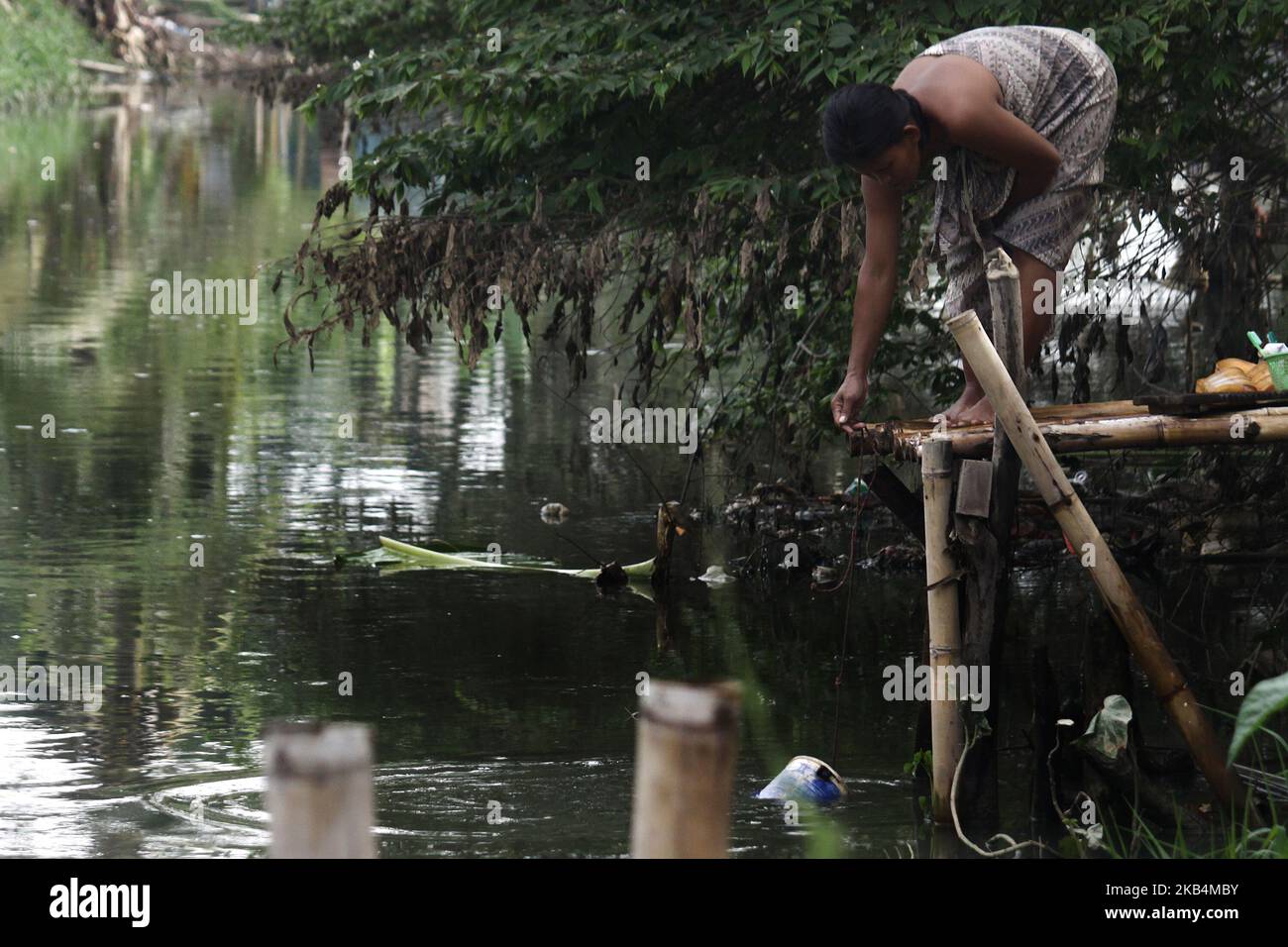 Citizens use dirty river water for their daily needs at Cikarang ...