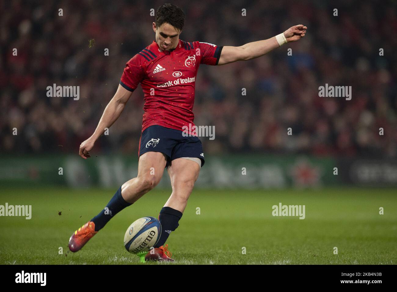 Joey Carbery of Munster kicks a penalty during the Heineken Champions ...