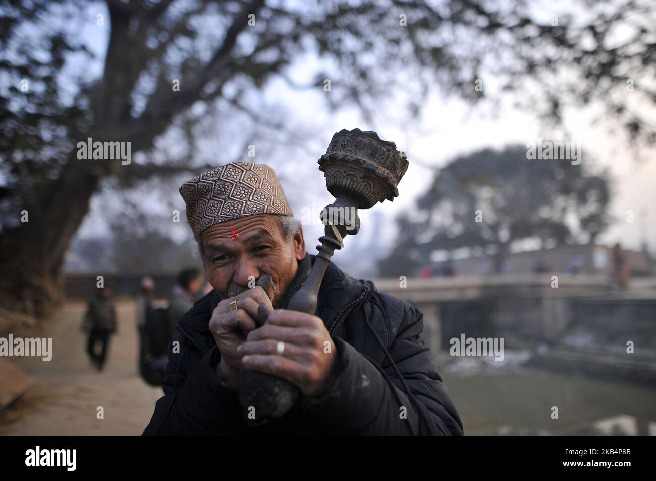 Nepalese hindu devotee smoke hukka hi-res stock photography and images ...