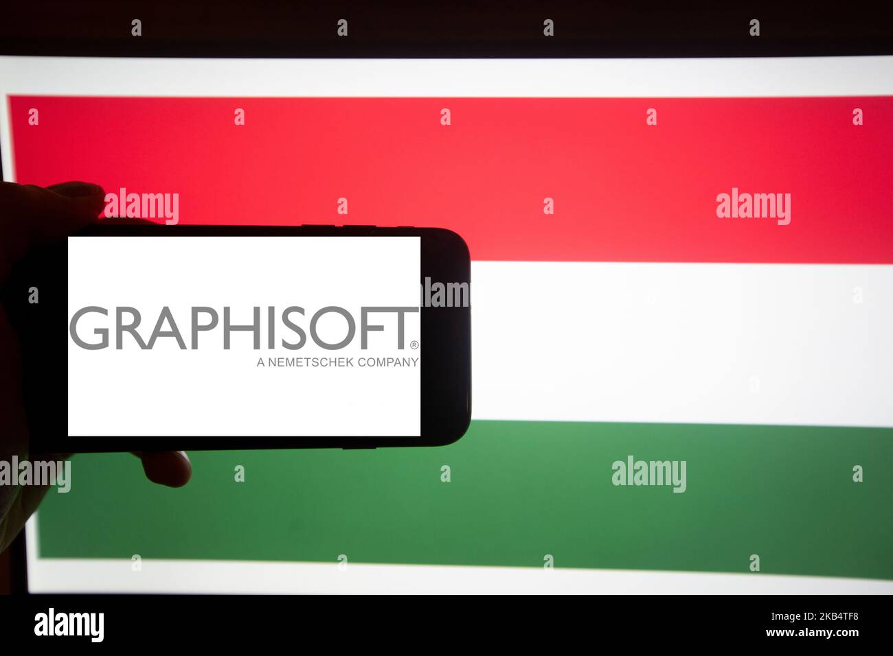 The logo of Graphisoft Park is seen on a screen of a smartphone in ...