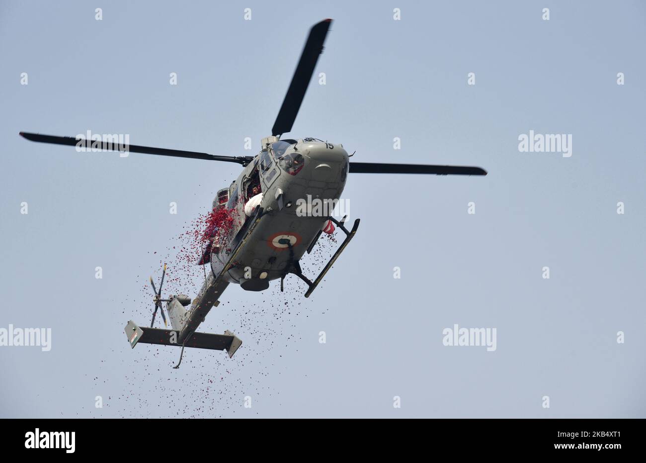 A helicopter of the Indian Air Force shower flowers during the 70th ...