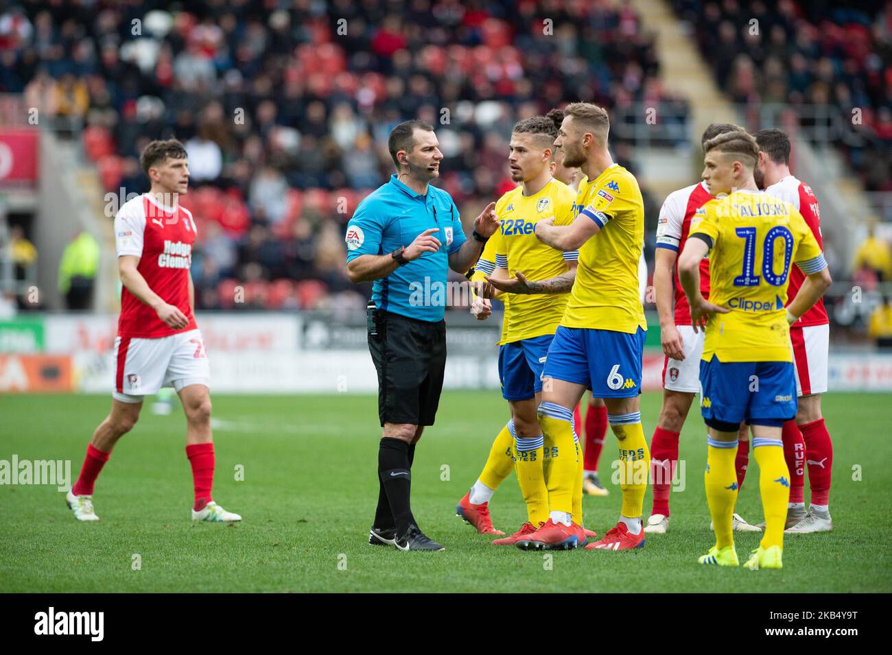 Leeds United players argue with referee, Tim Robinson, during the Sky ...