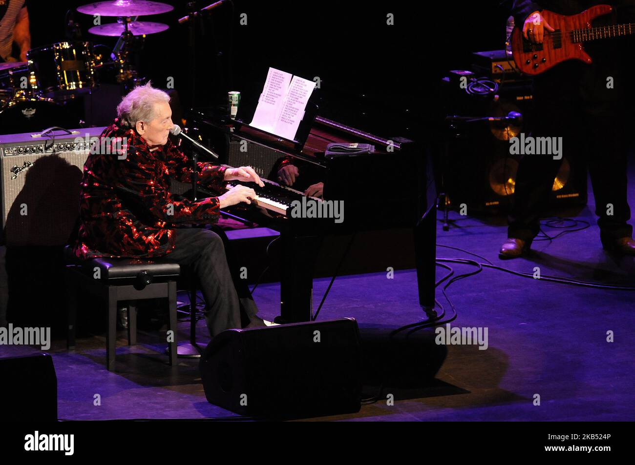 Rock and roll pioneer Jerry Lee Lewis performs on stage with his band ...
