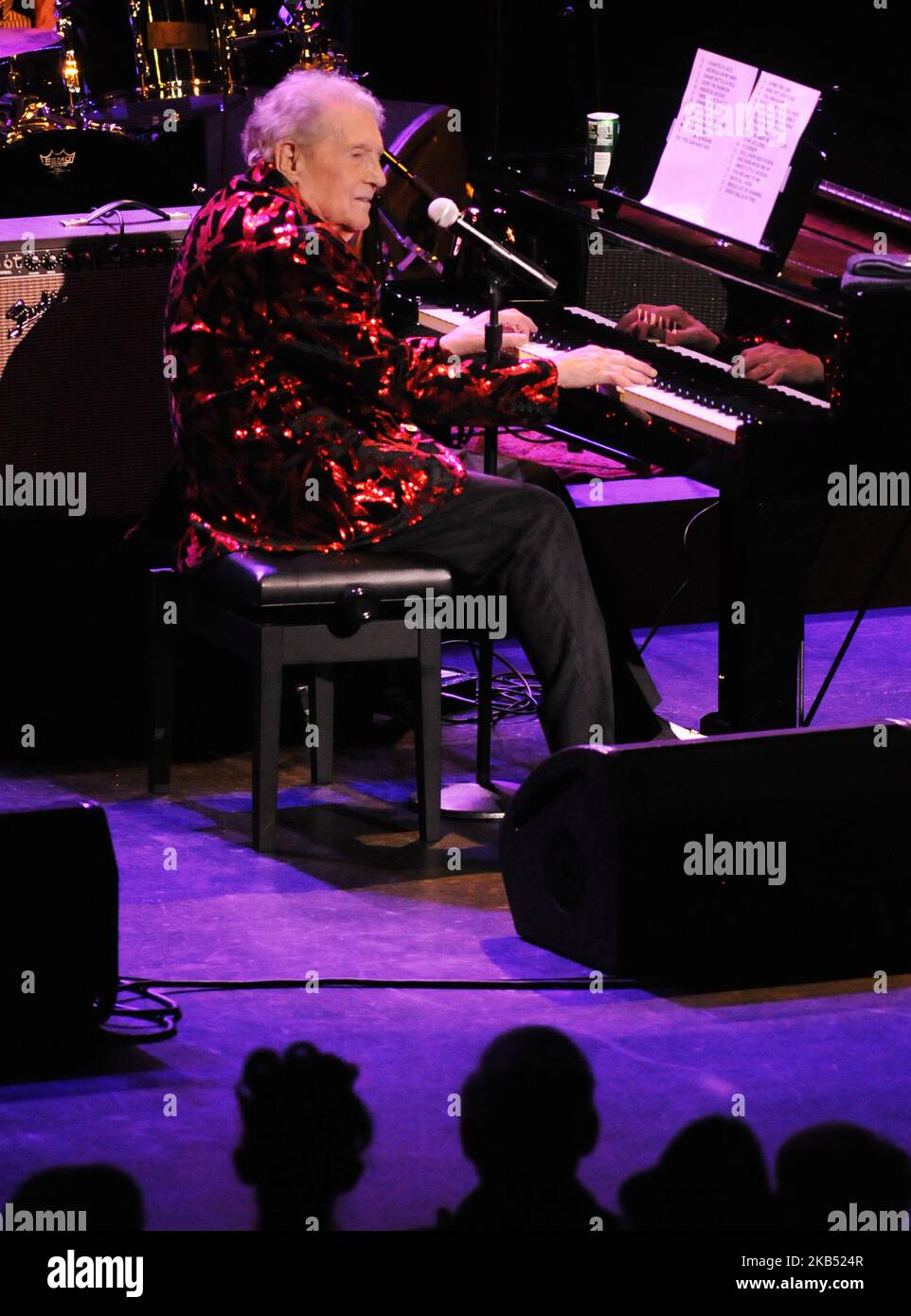 Rock and roll pioneer Jerry Lee Lewis performs on stage with his band ...