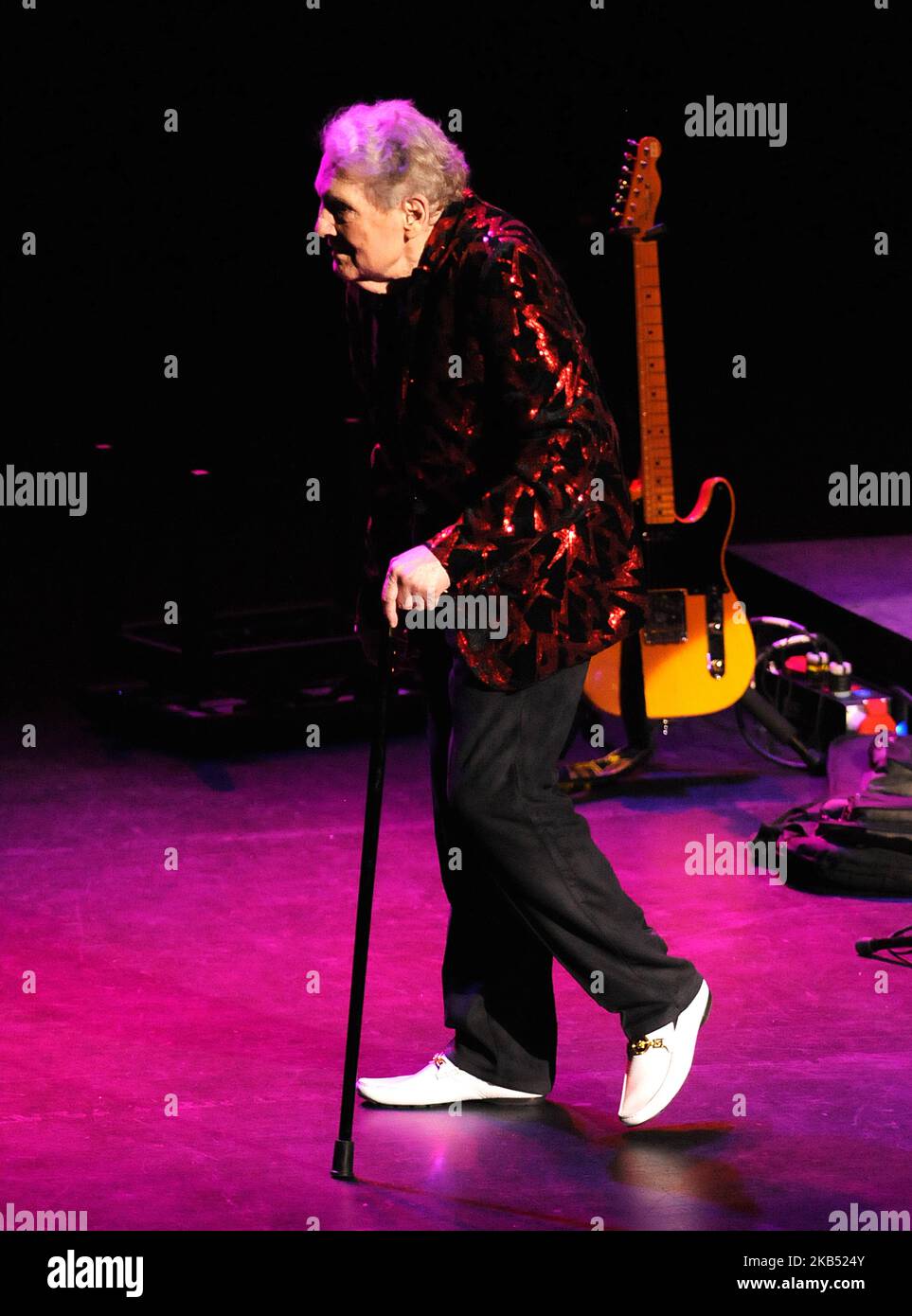 Rock and roll pioneer Jerry Lee Lewis departs the stage after ...