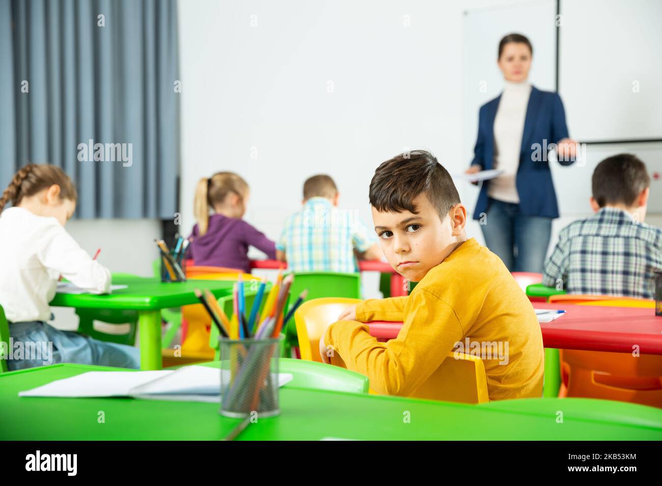 Child sitting separately in class hi-res stock photography and images ...