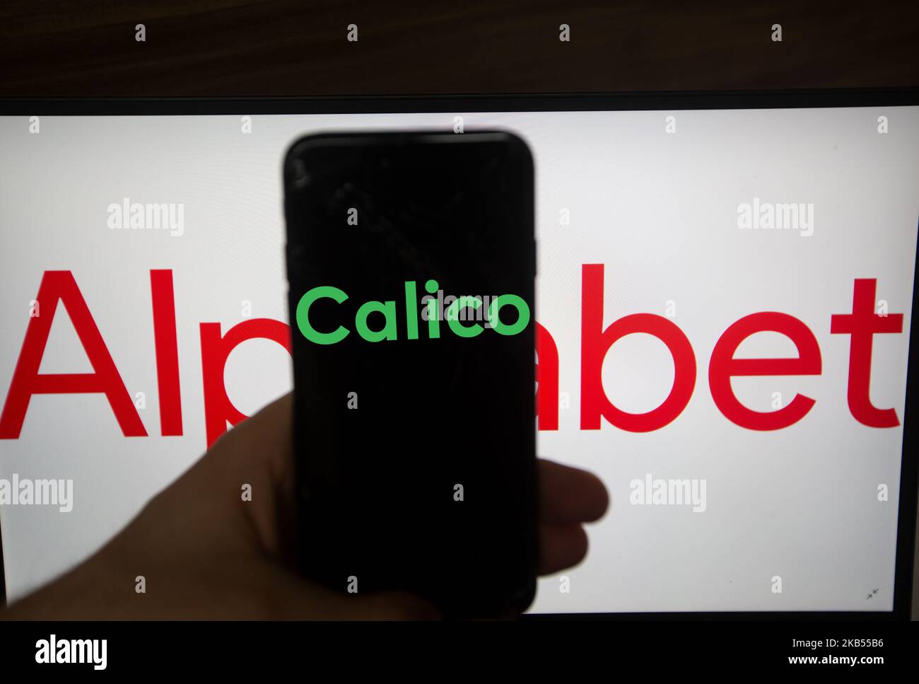 The logo of Calico is seen on a screen. In the background there is the ...