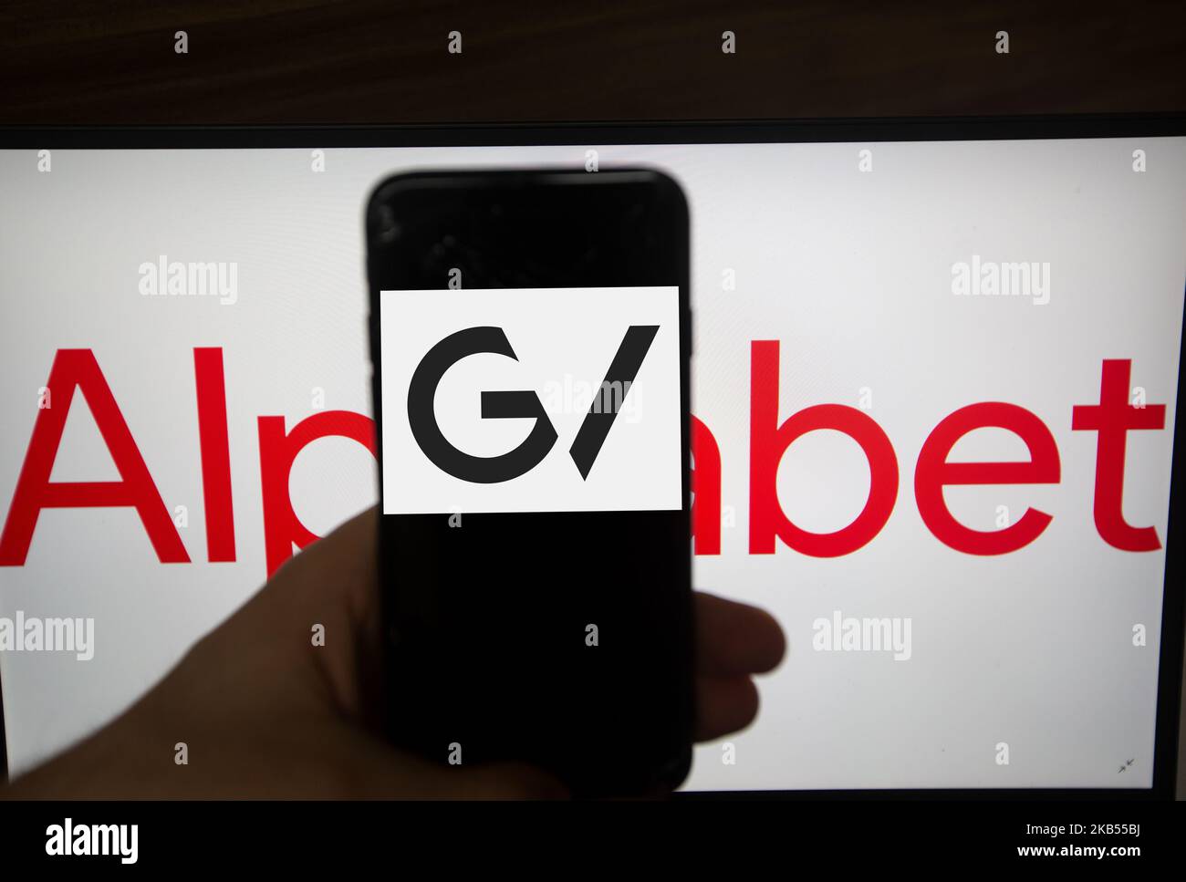 The logo of Google Venture is seen on a screen. In the background there ...