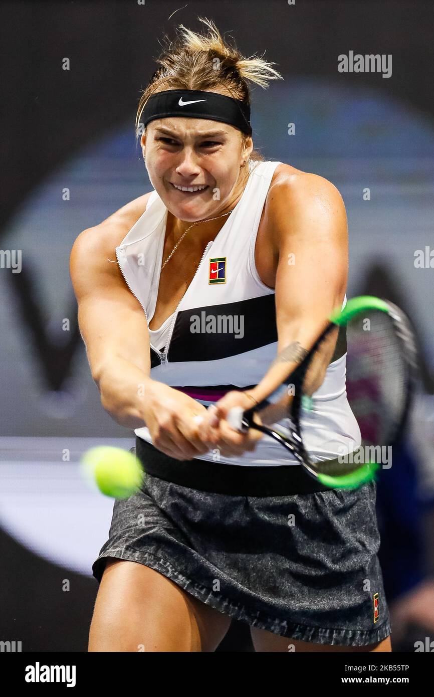 Aryna Sabalenka of Belarus returns the ball to Alison Van Uytvanck of ...