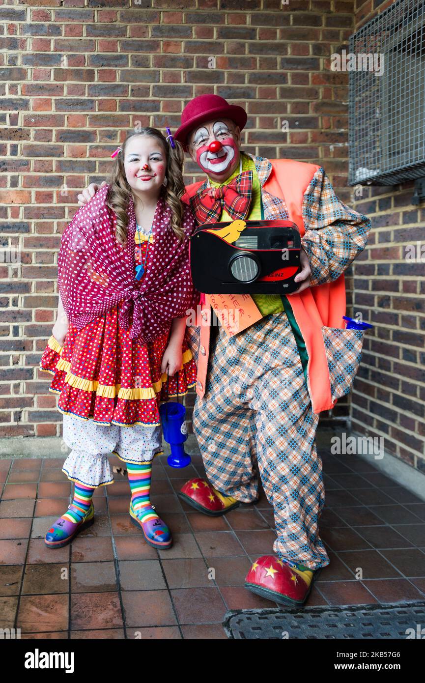 Clowns pose for a photo outside the All Saints Church in Haggerston ...