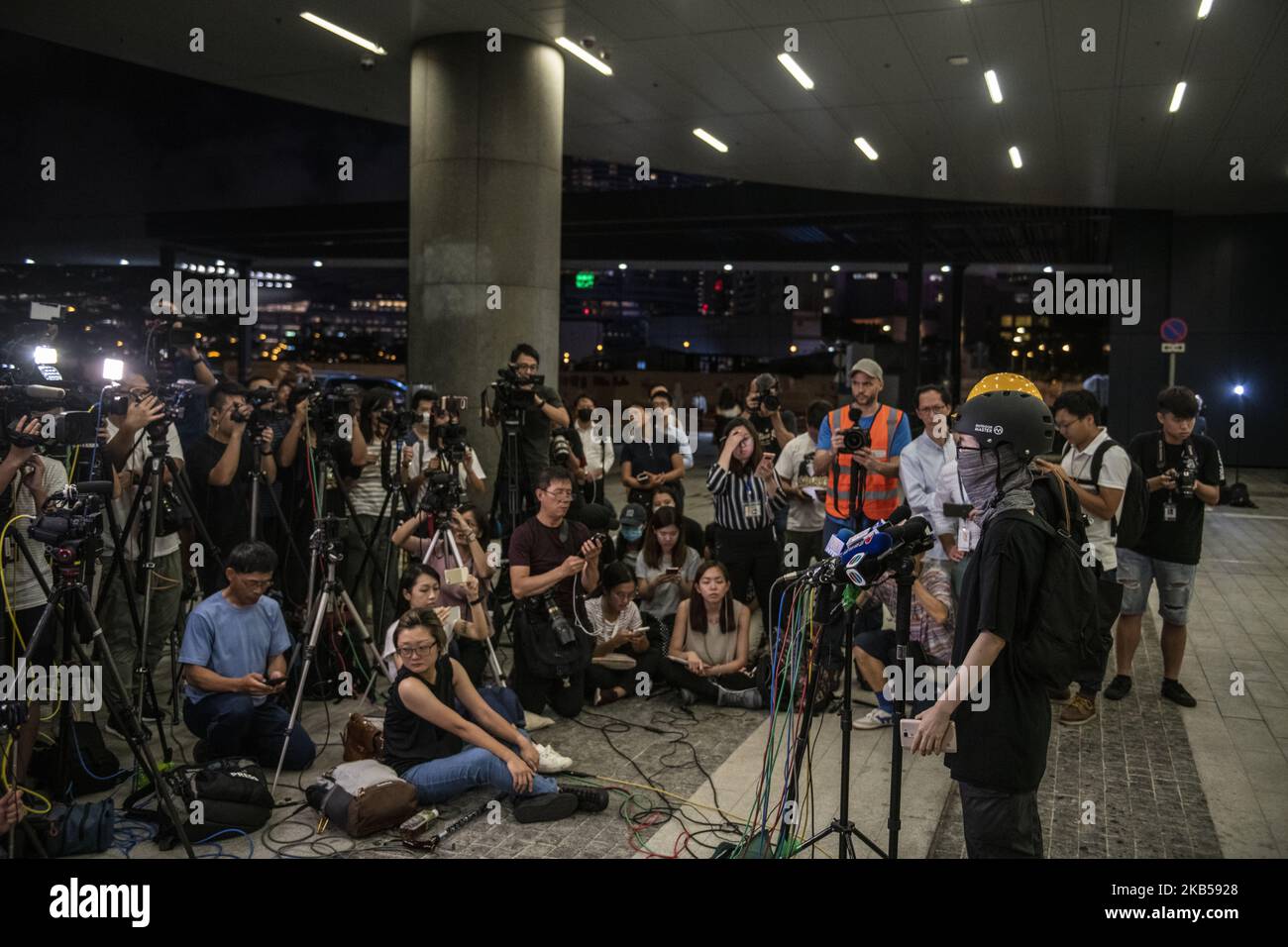 Protester are seen wearing helmets while attending a Citizen's Press ...