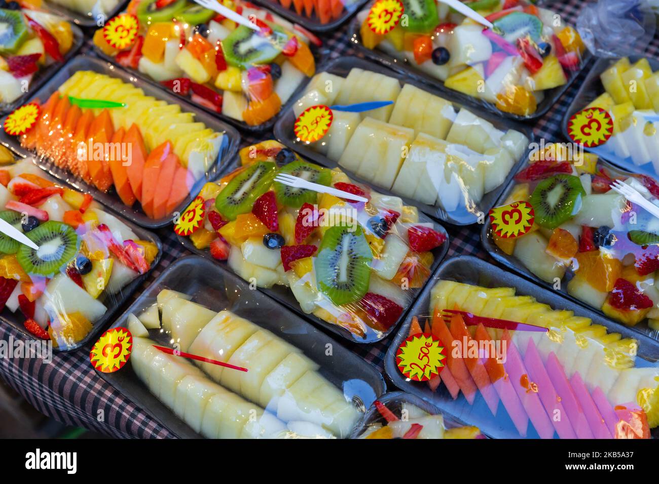 Mixed cut fruits packed for sale Stock Photo - Alamy