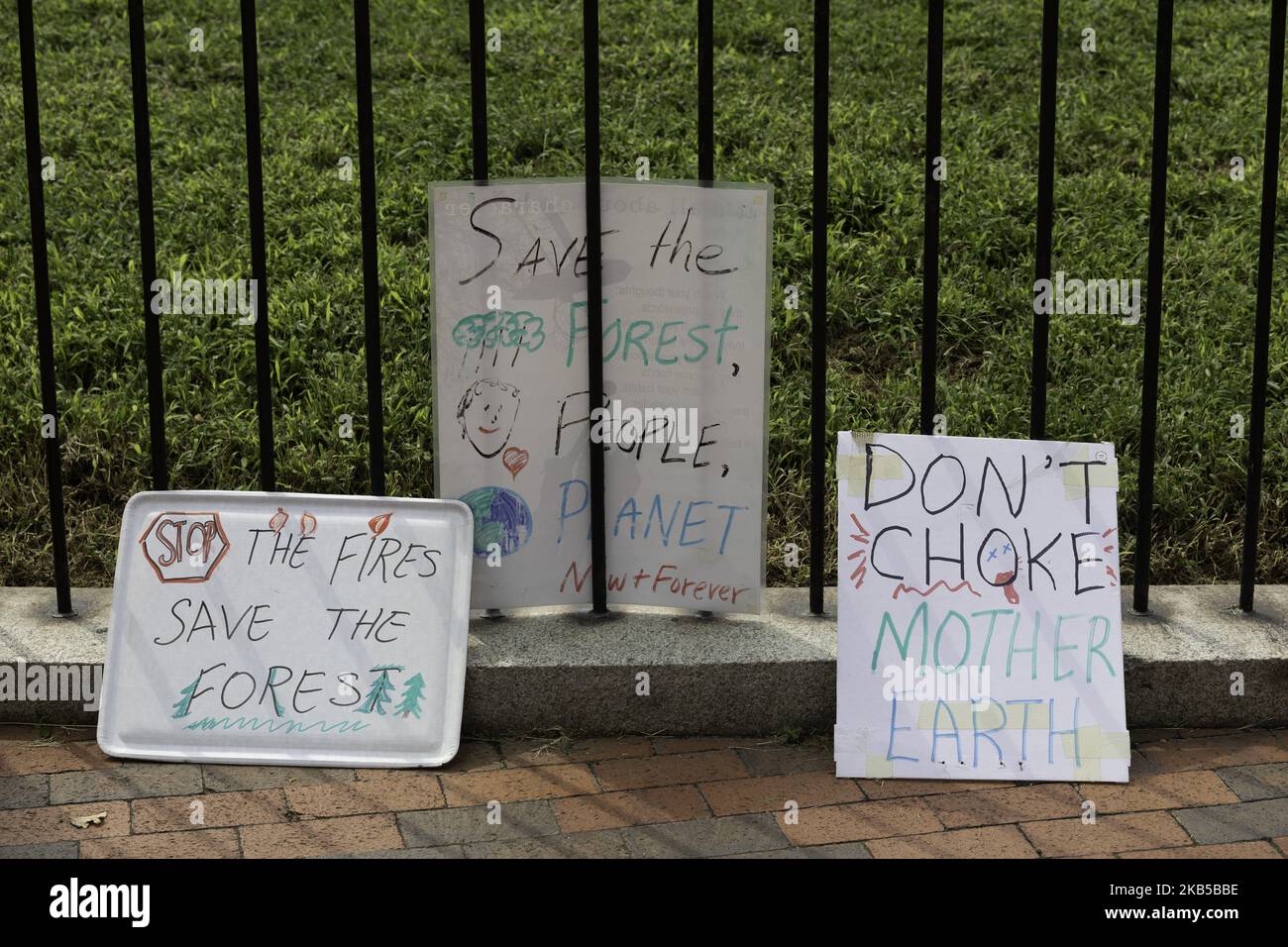 Signs are seen as a part in a demonstration demanding protection for ...
