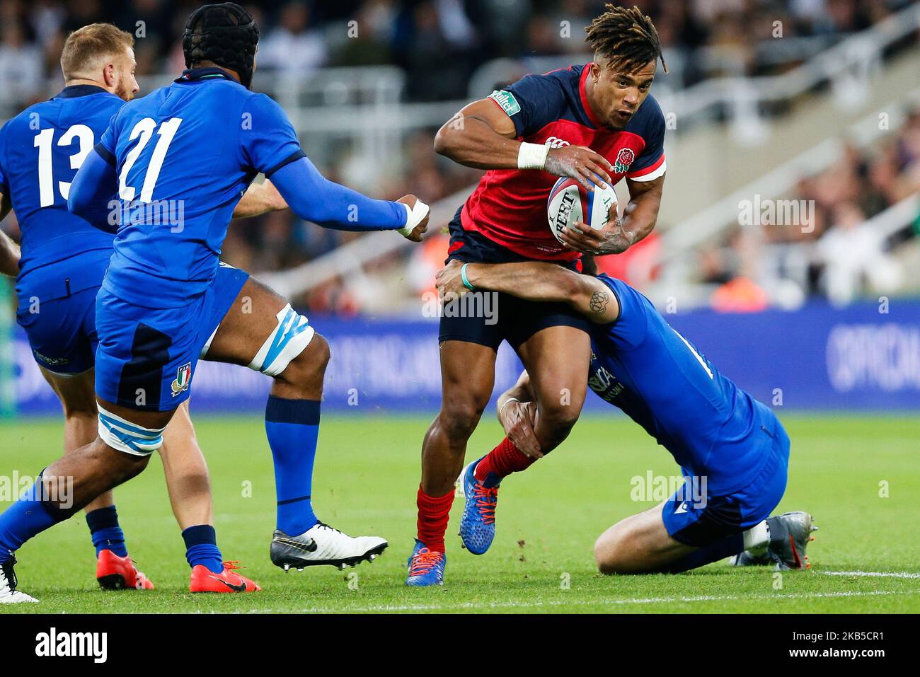 Anthony Watson of England takes on the Italian defence during the ...