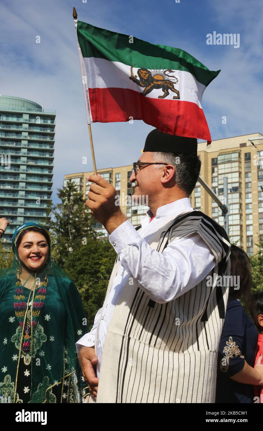 Iranian Canadians dressed in traditional costumes showcasing the ...