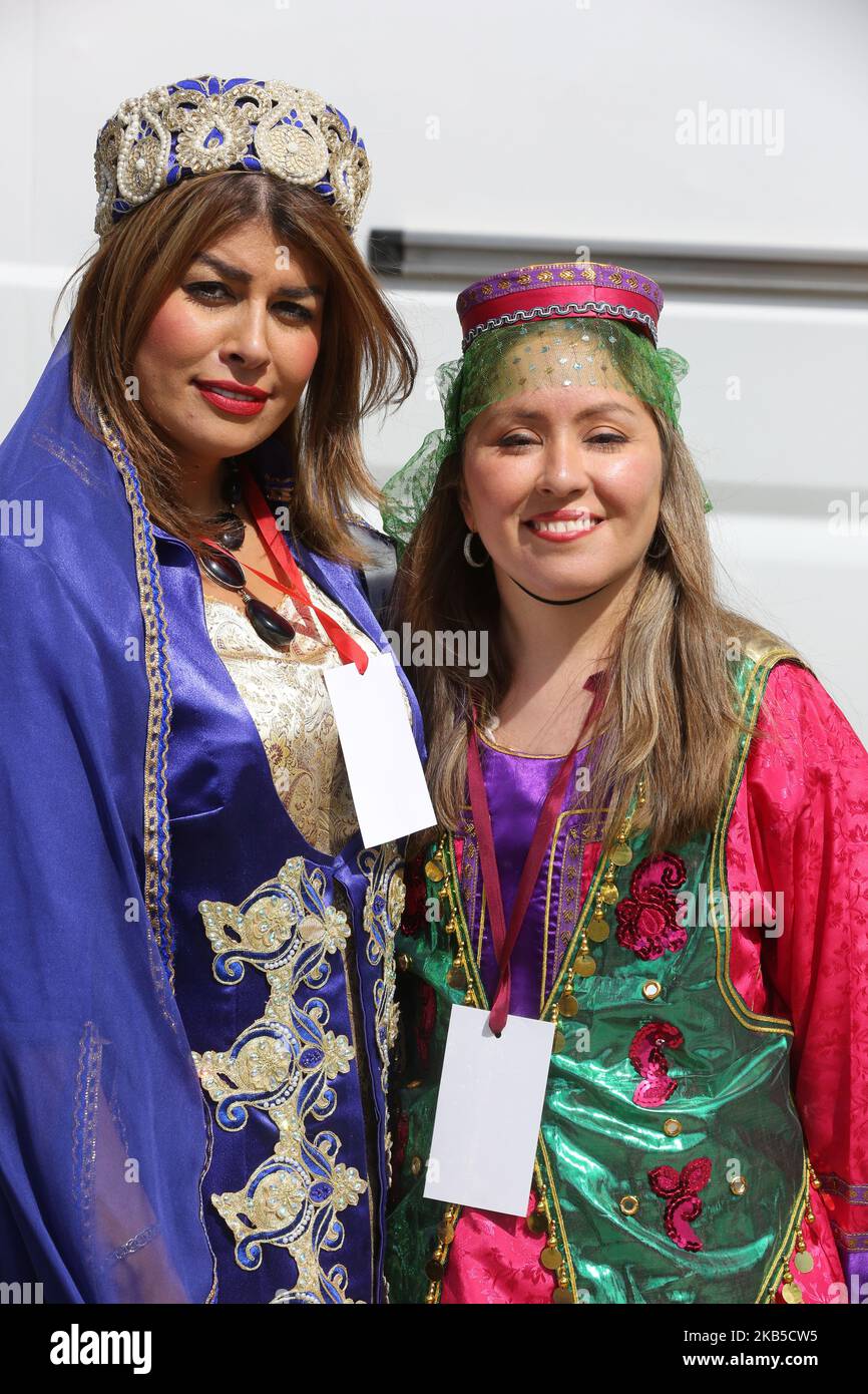Iranian Canadians dressed in traditional costumes showcasing the ...