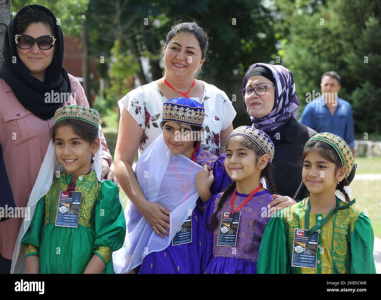 Iranian Canadians dressed in traditional costumes showcasing the ...