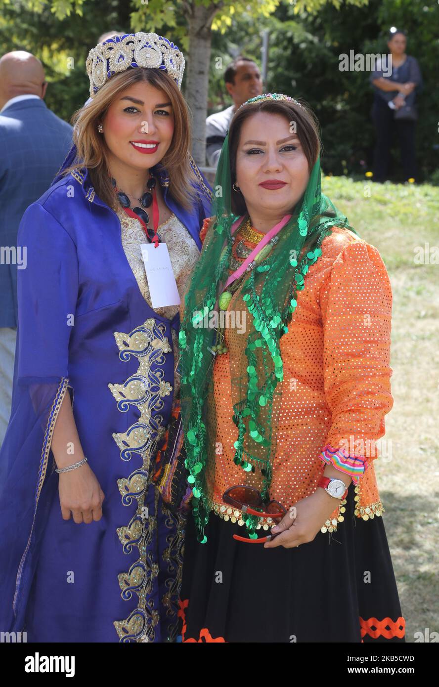 Iranian Canadians dressed in traditional costumes showcasing the ...