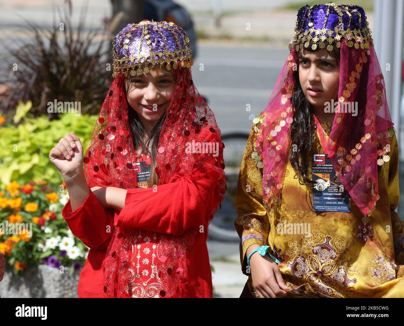 Iranian Canadians dressed in traditional costumes showcasing the ...