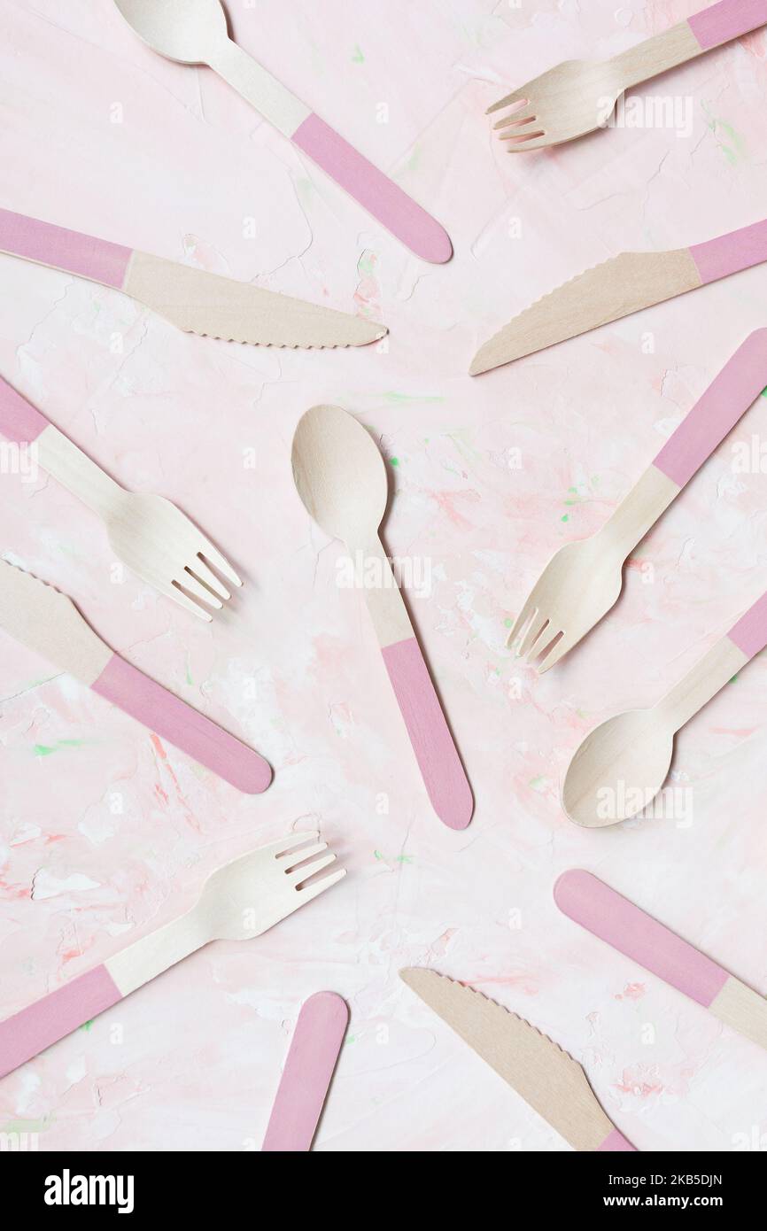 Disposable eco friendly bamboo cutlery pattern on pink background ...