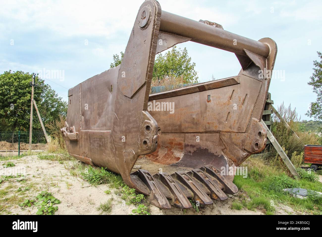 Giant excavator bucket in the amber open pit mine, on the largest in ...