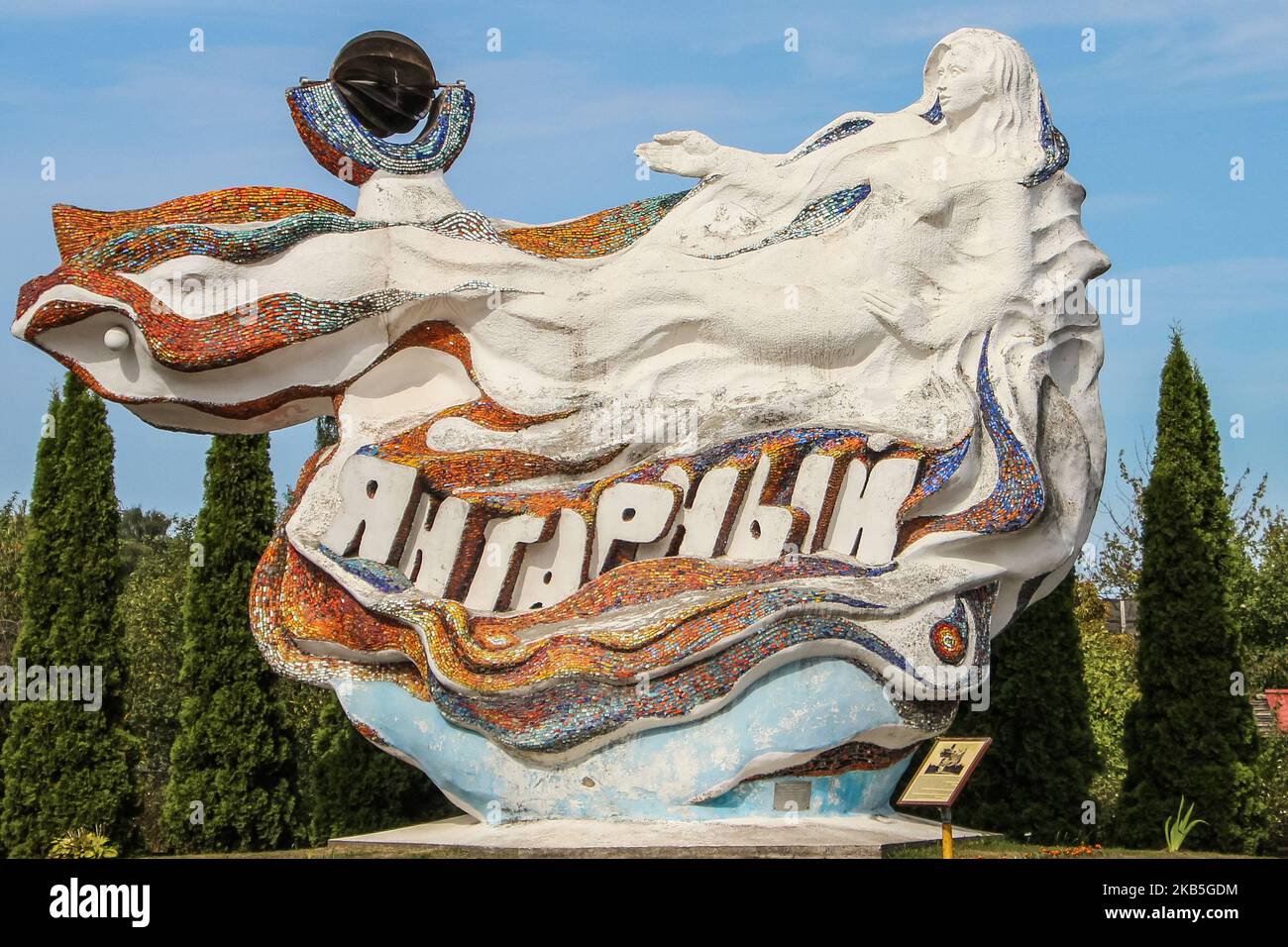 Large welcoming sign at the entrance to the city is seen in Yantarny ...