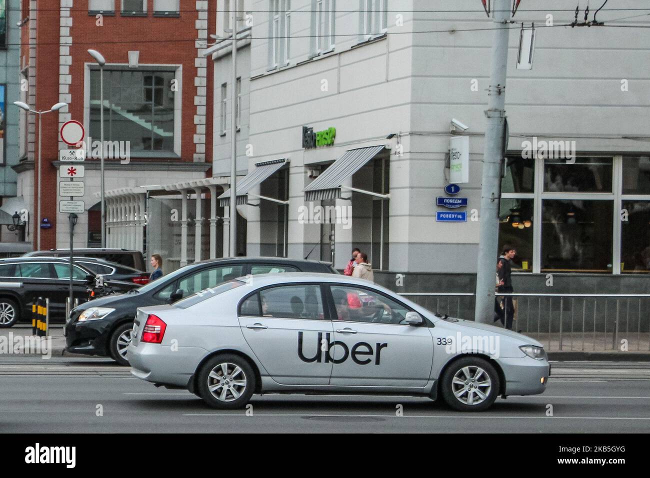 Uber driver driving an Uber Russia (joint venture with Yandex taxi ...