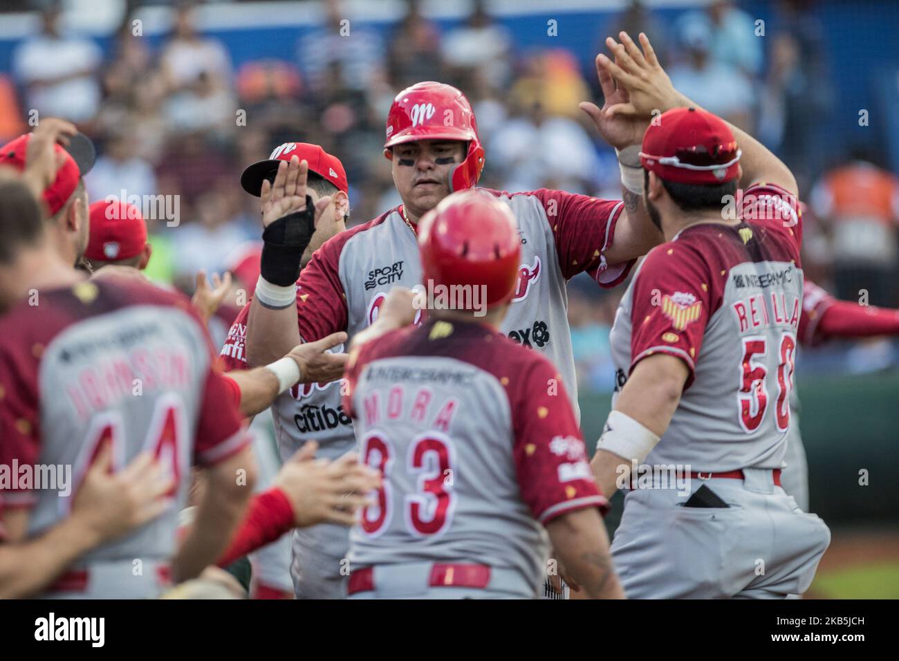 Diablos Rojos celebrates against of Tigres de Quintana Roo during fifth ...