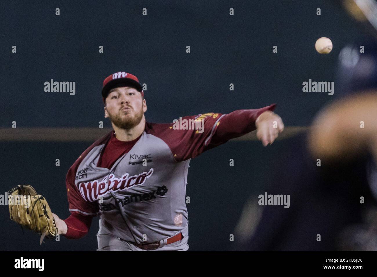 Matt Gage of Diablos Rojos #56 pitches against of Tigres de Quintana ...