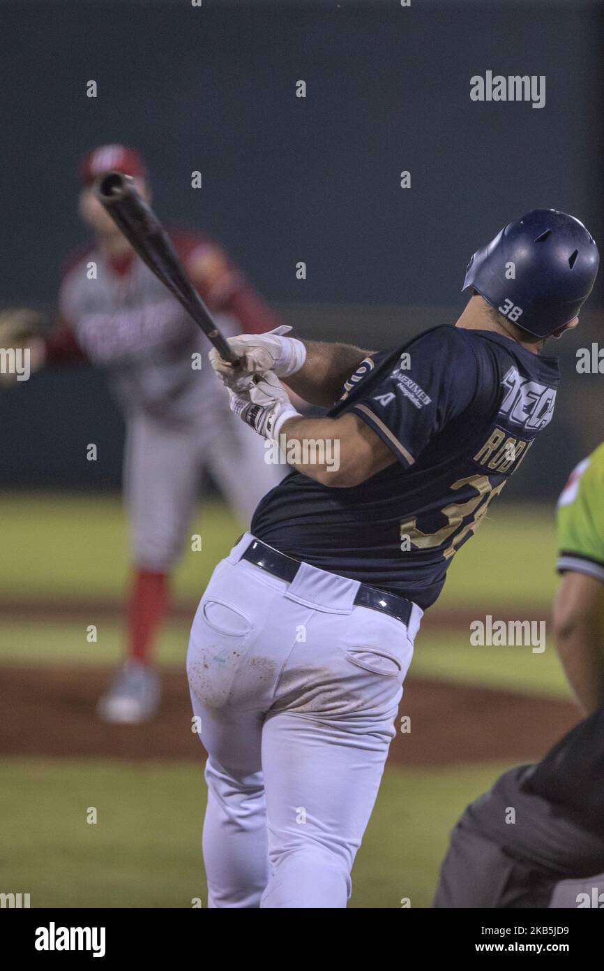 Alex Robles of Tigres de Quintana Roo #38 hits against of Diablos Rojos ...