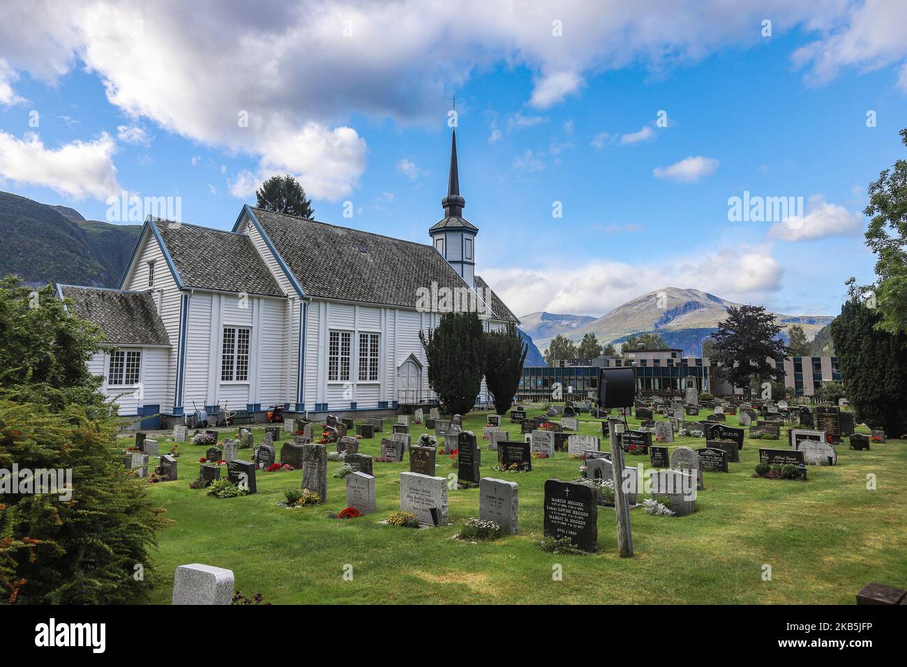 Cemetery with graves or tombs and a church at Valldal or Valldalen ...