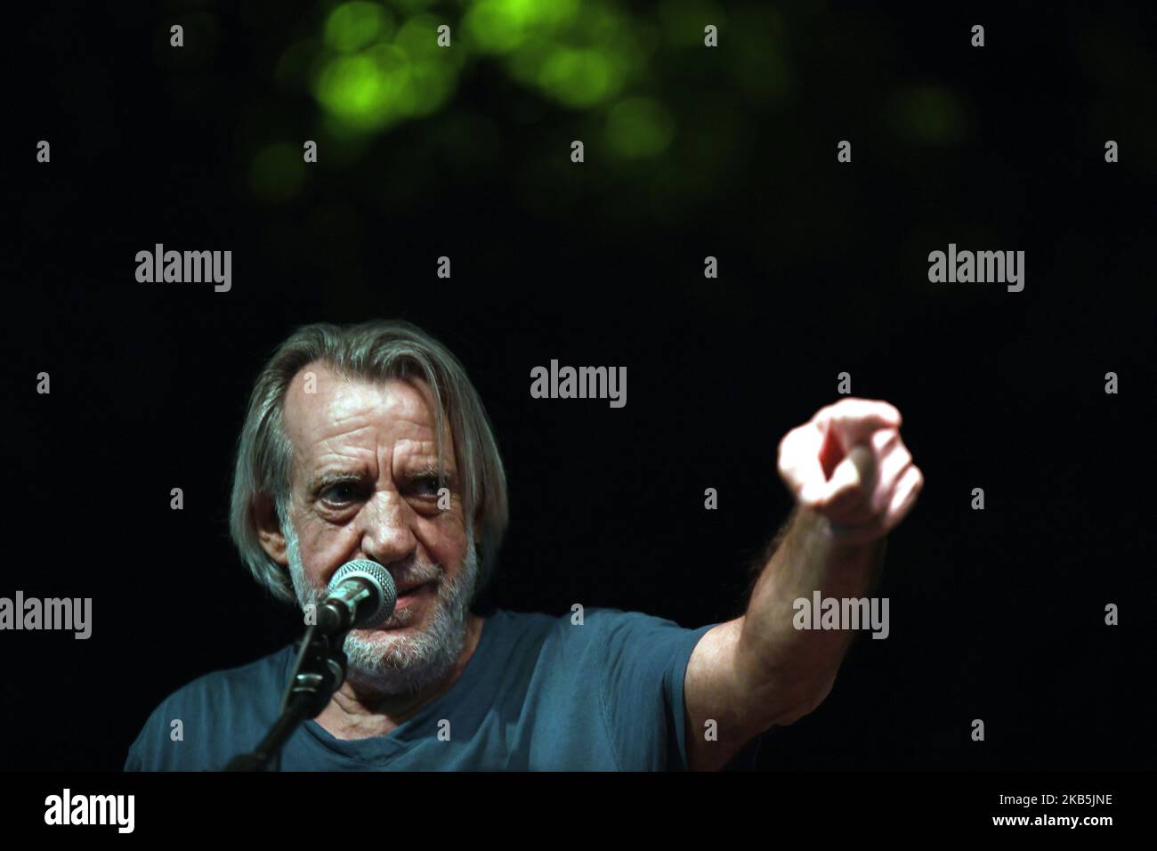 Luis Pastor (singer-songwriter) during a concentration of neighbors in ...