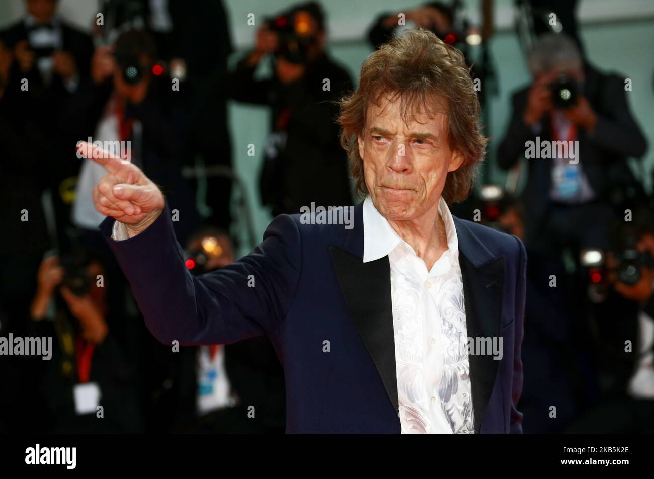 Mick Jagger walks the red carpet ahead of the "The Burnt Orange Heresy ...