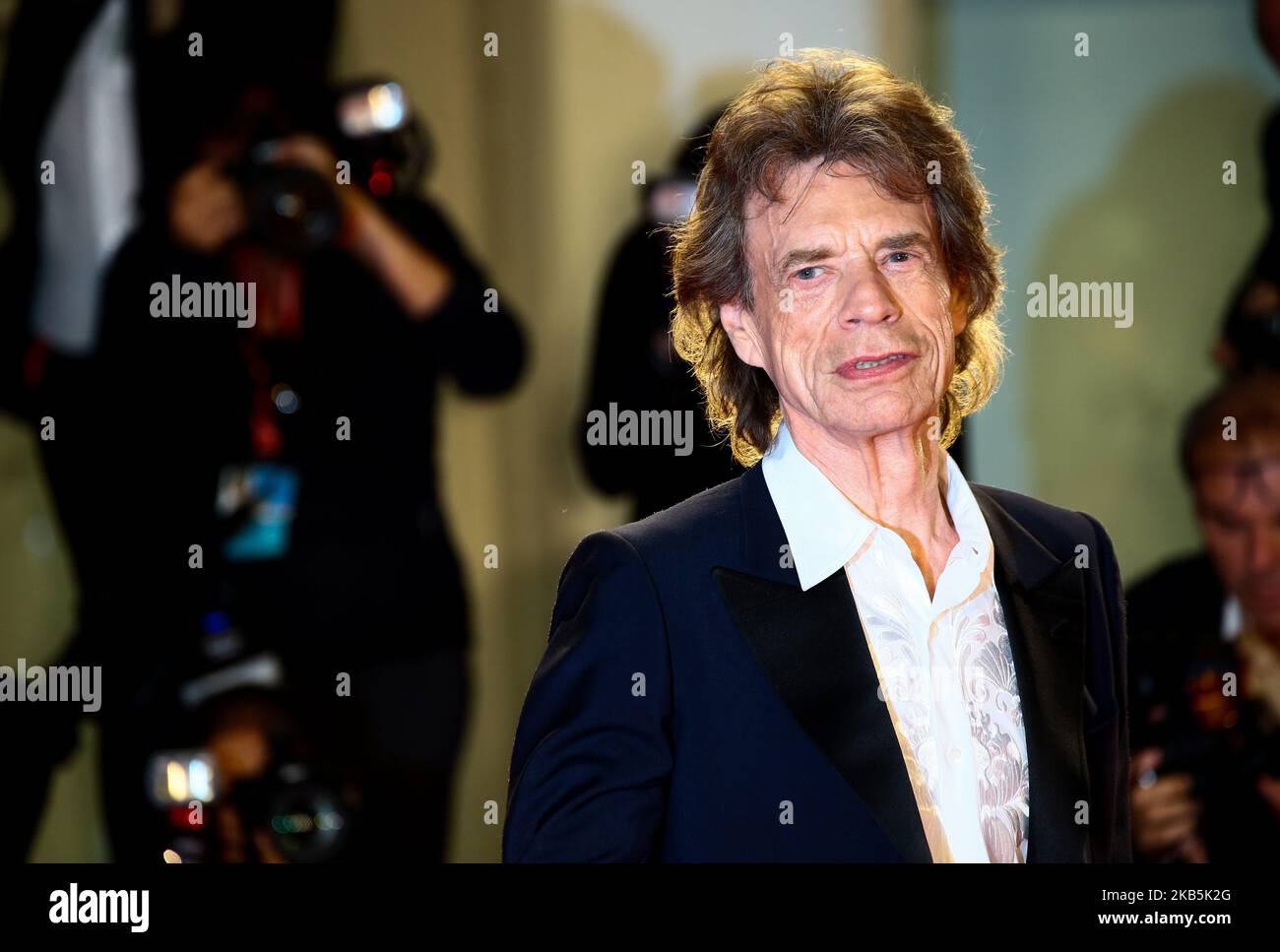 Mick Jagger walks the red carpet ahead of the "The Burnt Orange Heresy ...