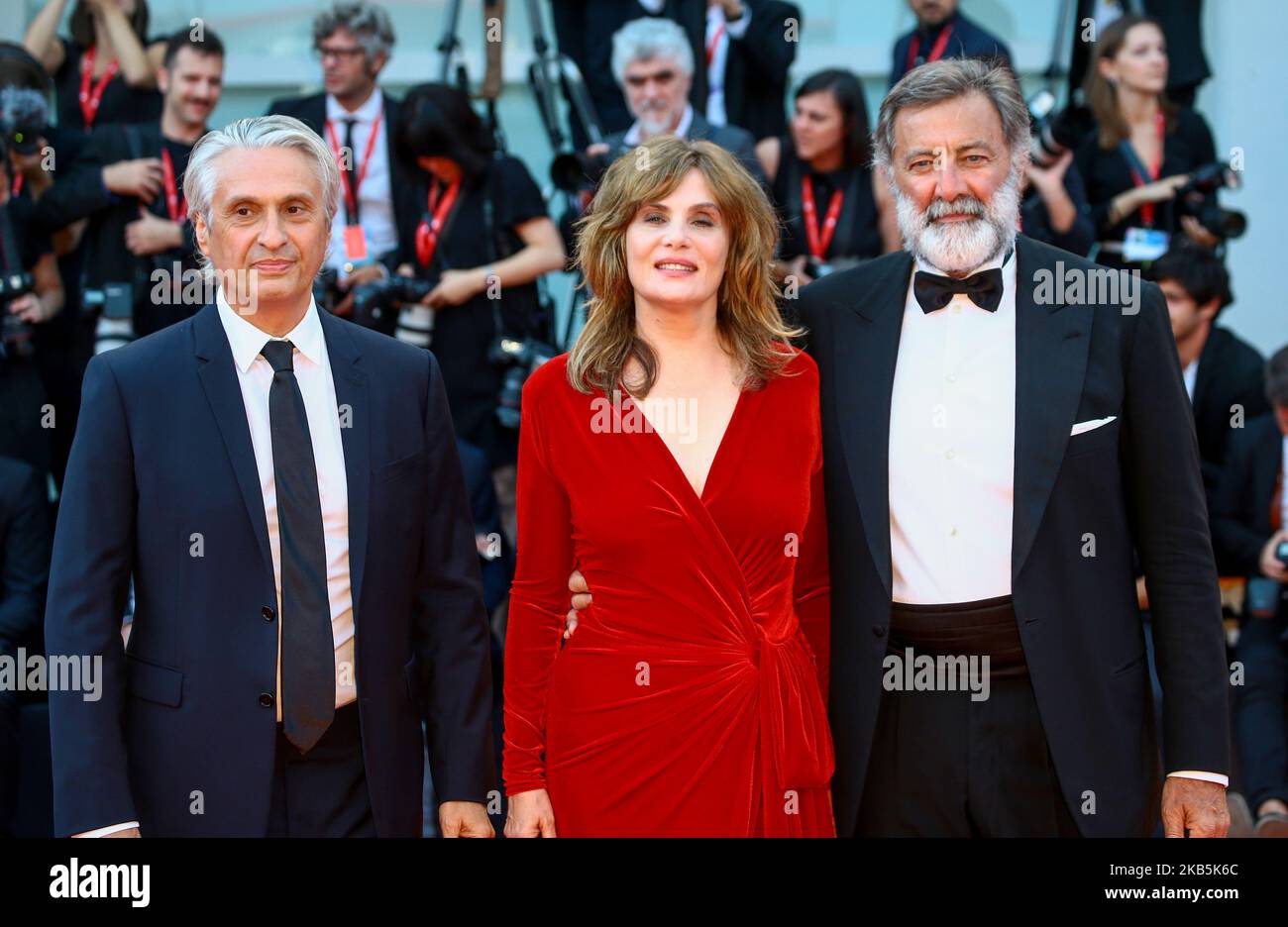(R-L) Luca Barbareschi, Emmanuelle Seigner and Alain Goldman walk the ...