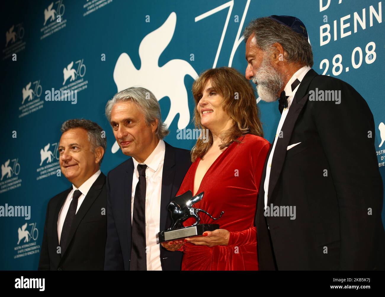 French actress Emmanuelle Seigner, flanked by (FromL) Italian producer ...