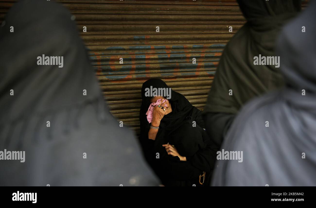 A muslim woman mourns during the procession of Muharram in Kolkata ...
