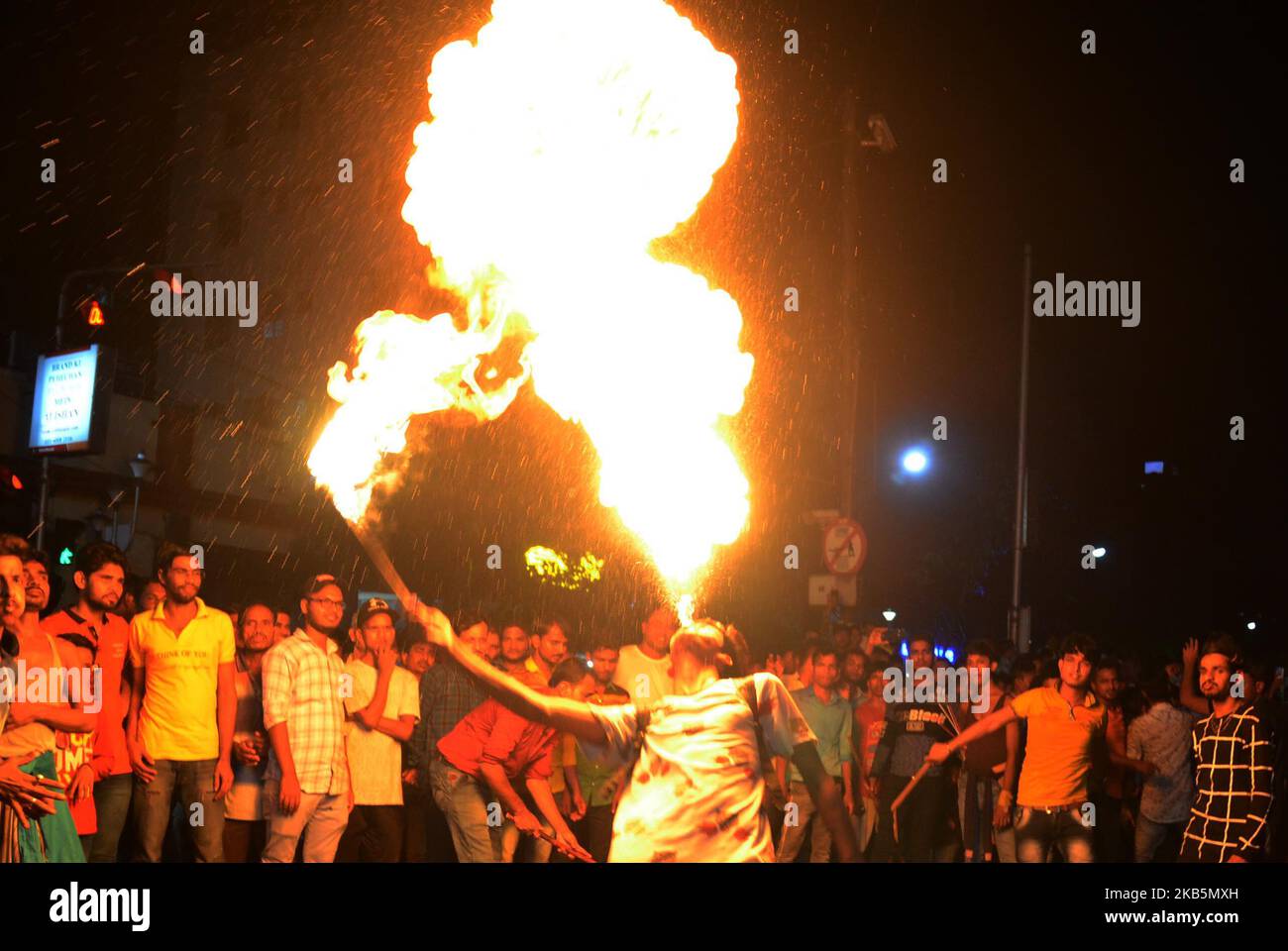 Indian Shiite Muslim fire eaters perform stunts on the occasion of ...