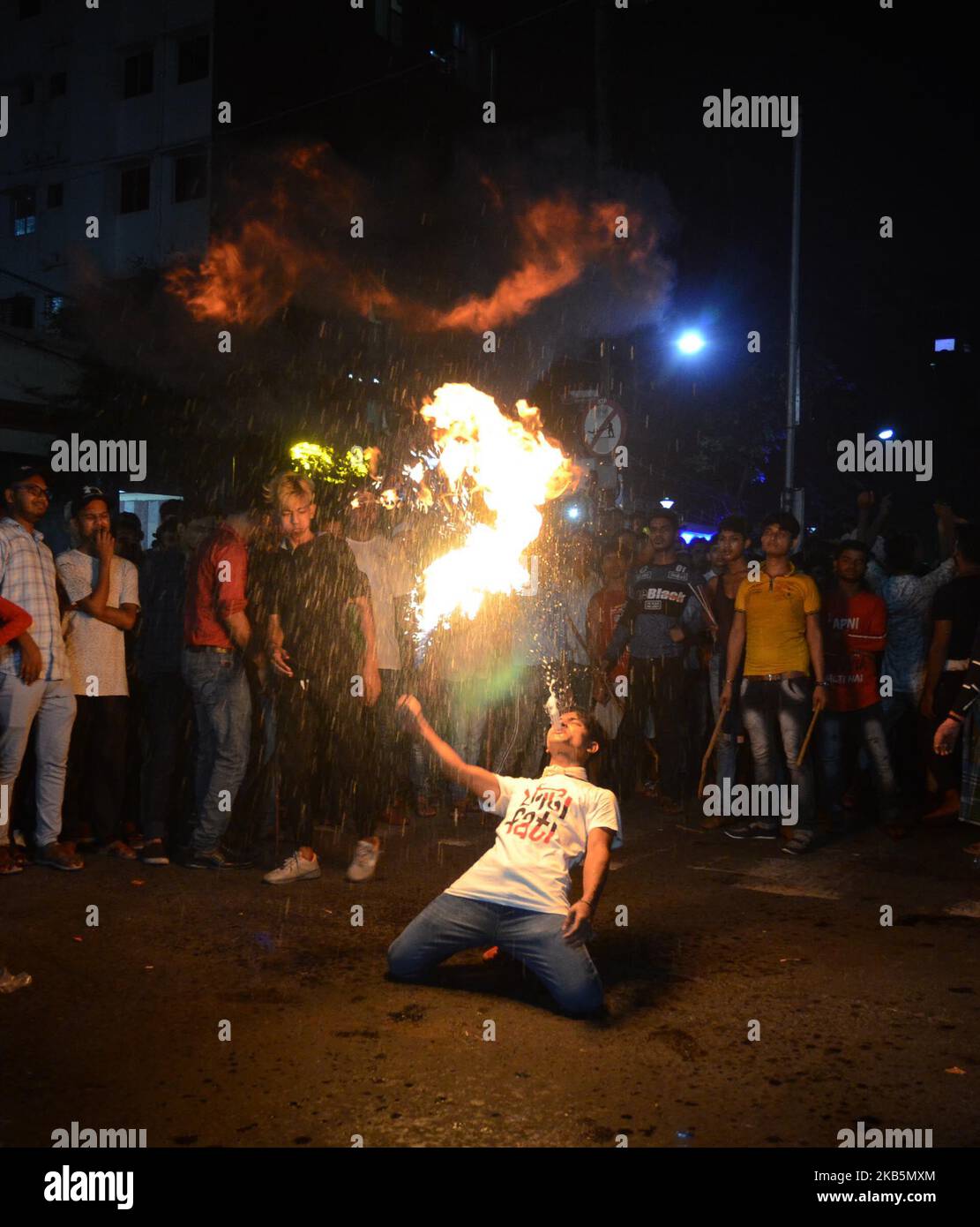 Indian Shiite Muslim fire eaters perform stunts on the occasion of ...