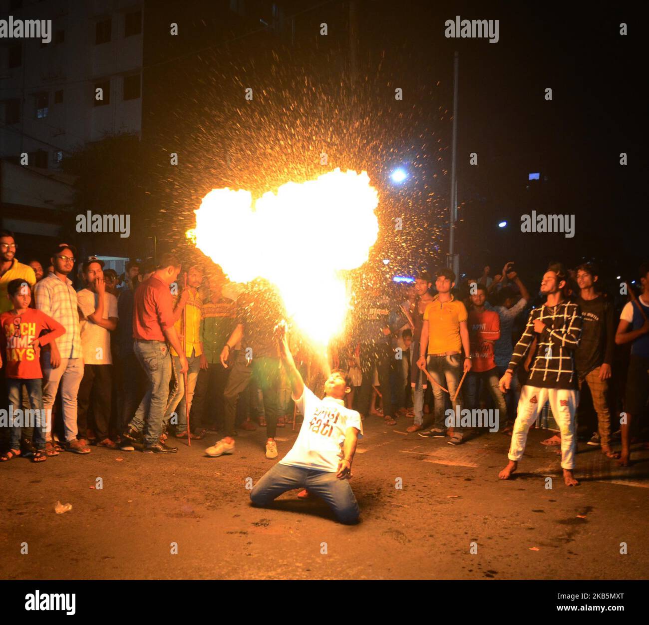 Indian Shiite Muslim fire eaters perform stunts on the occasion of ...