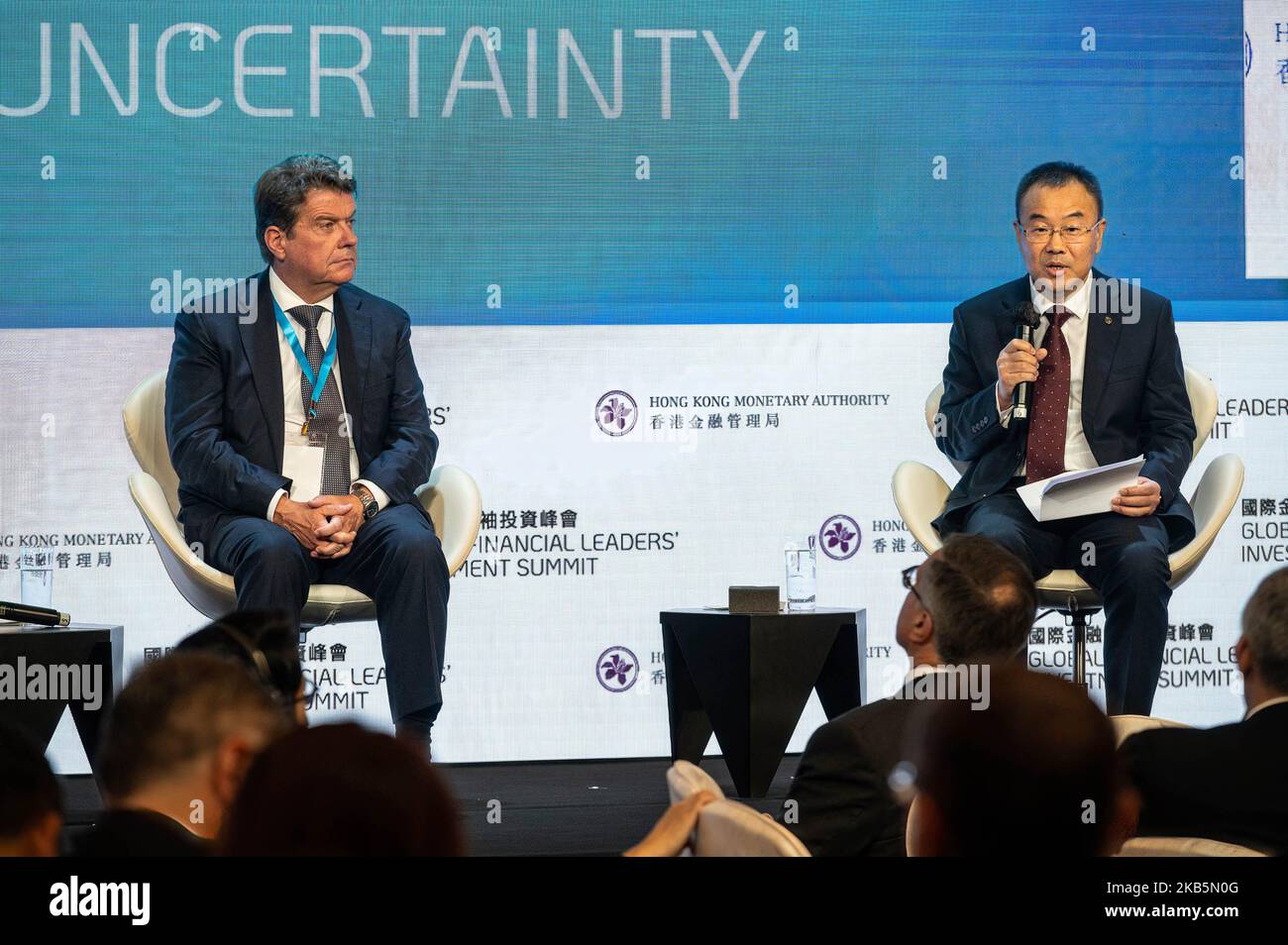 Colm Kelleher (L), chairman of UBS Group AG, and Liu Jin (R), president ...
