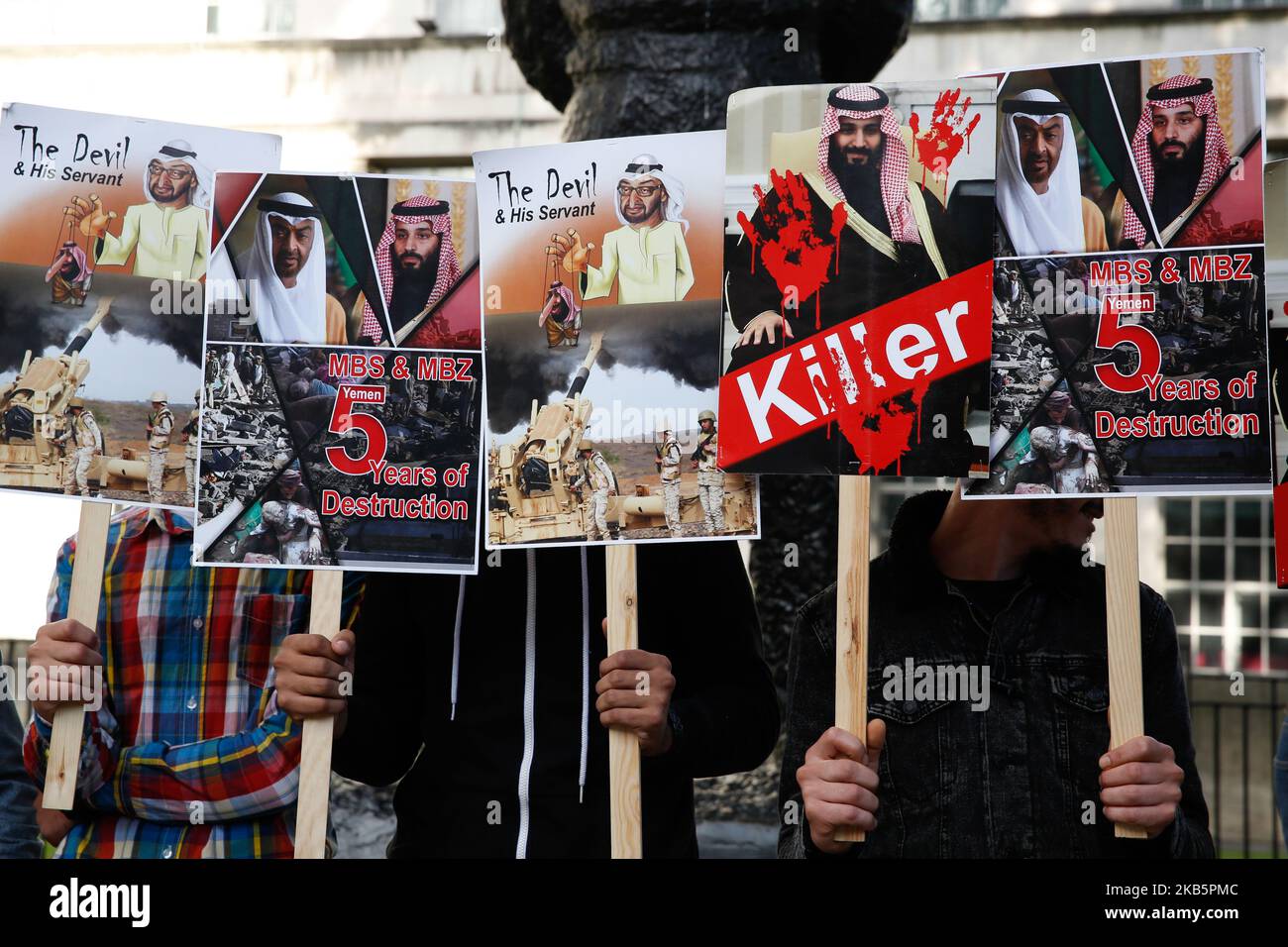 A group of people protest against an engagement of Saudi Arabia and UAE ...