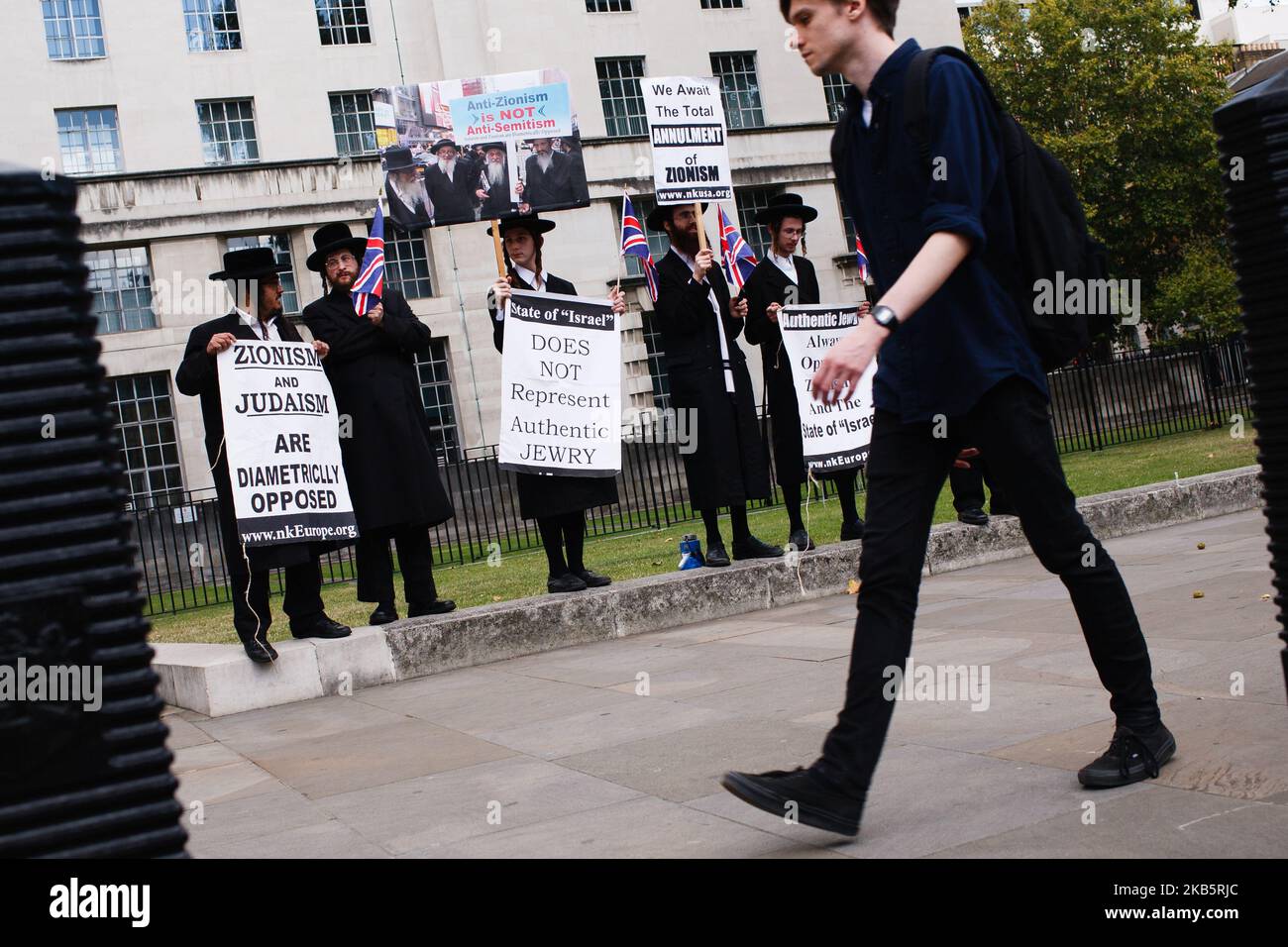 A group of anti-Zionist Orthodox Jews protest against the establishment ...