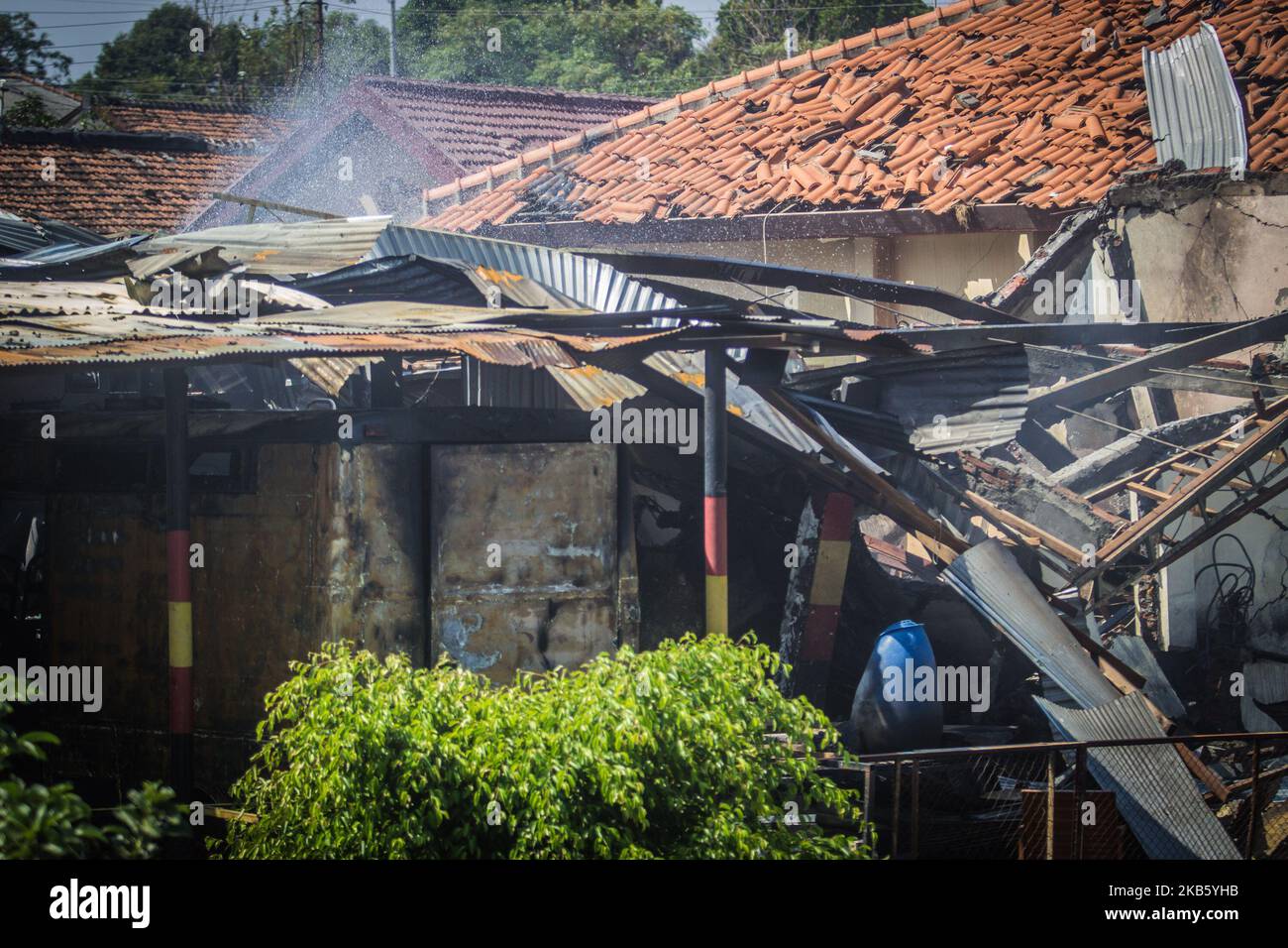 A destroyed warehouse in Semarang, Central Java, Indonesia, following ...